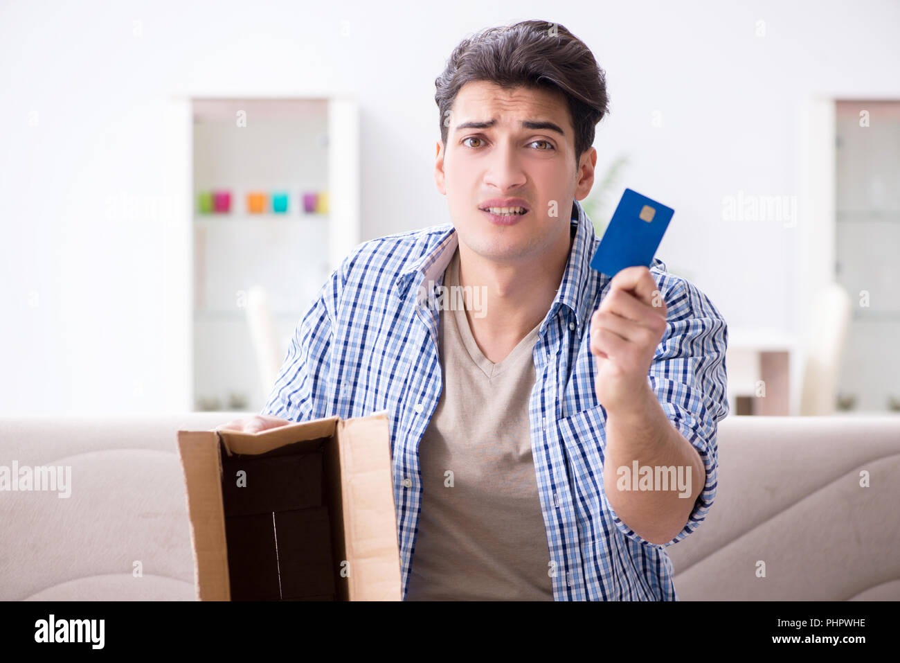 Man receiving empty parcel with stolen goods Stock Photo - Alamy