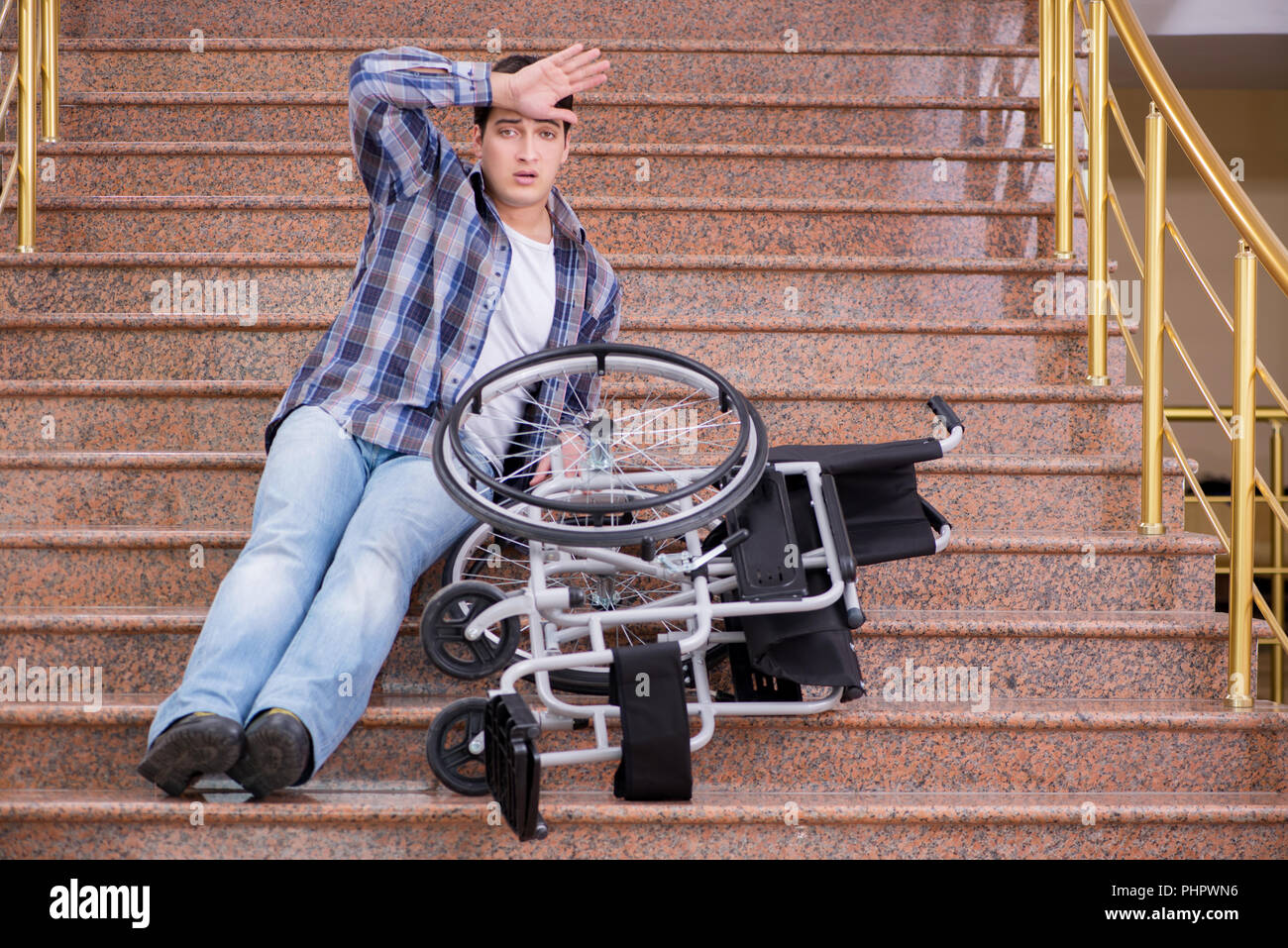 Disabled man on wheelchair having trouble with stairs Stock Photo - Alamy