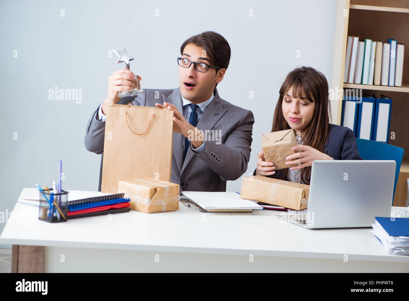 Business people receiving new mail and parcels Stock Photo - Alamy