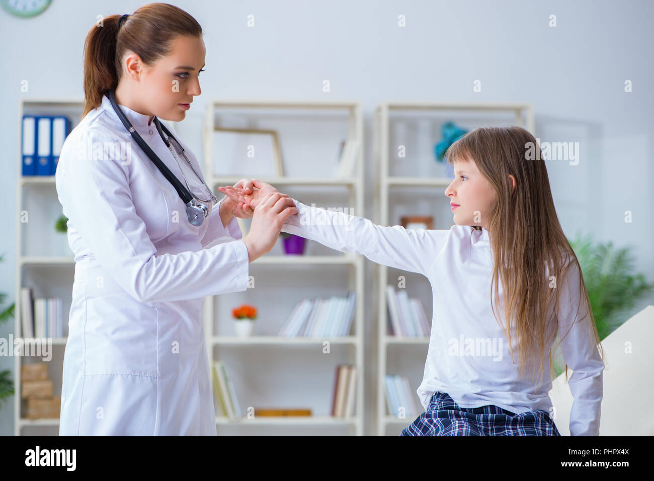 Female doctor pediatrician checking girl Stock Photo - Alamy Female doctor pediatrician checking girl Stock Photo - Alamy