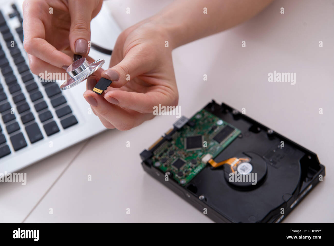 Hard drive repair and data recovery with restoration Stock Photo - Alamy