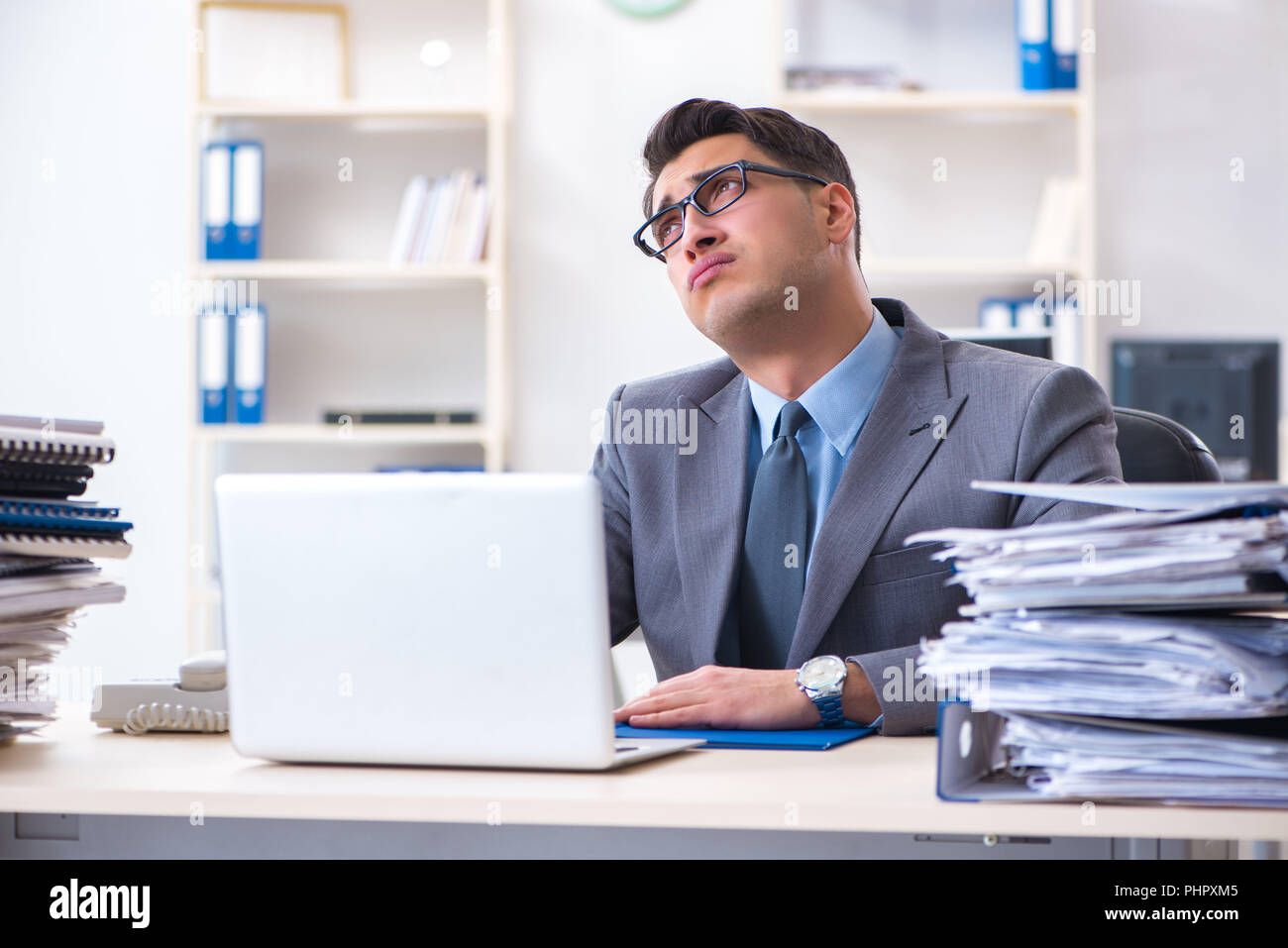 Overloaded work employee under hi-res stock photography and images - Alamy