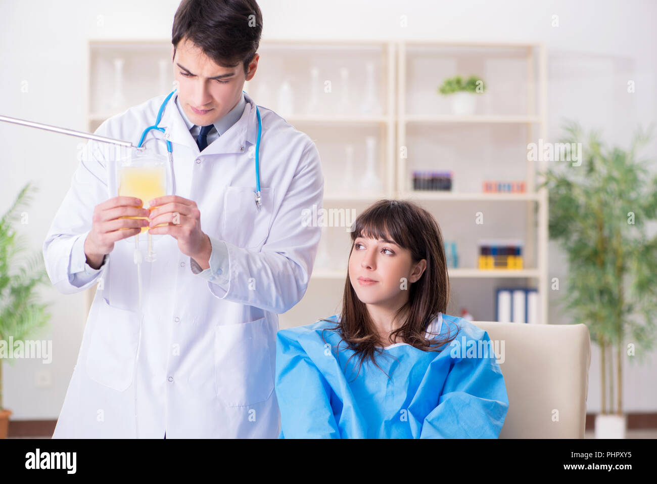 Doctor discussing blood transfusion with patient Stock Photo - Alamy
