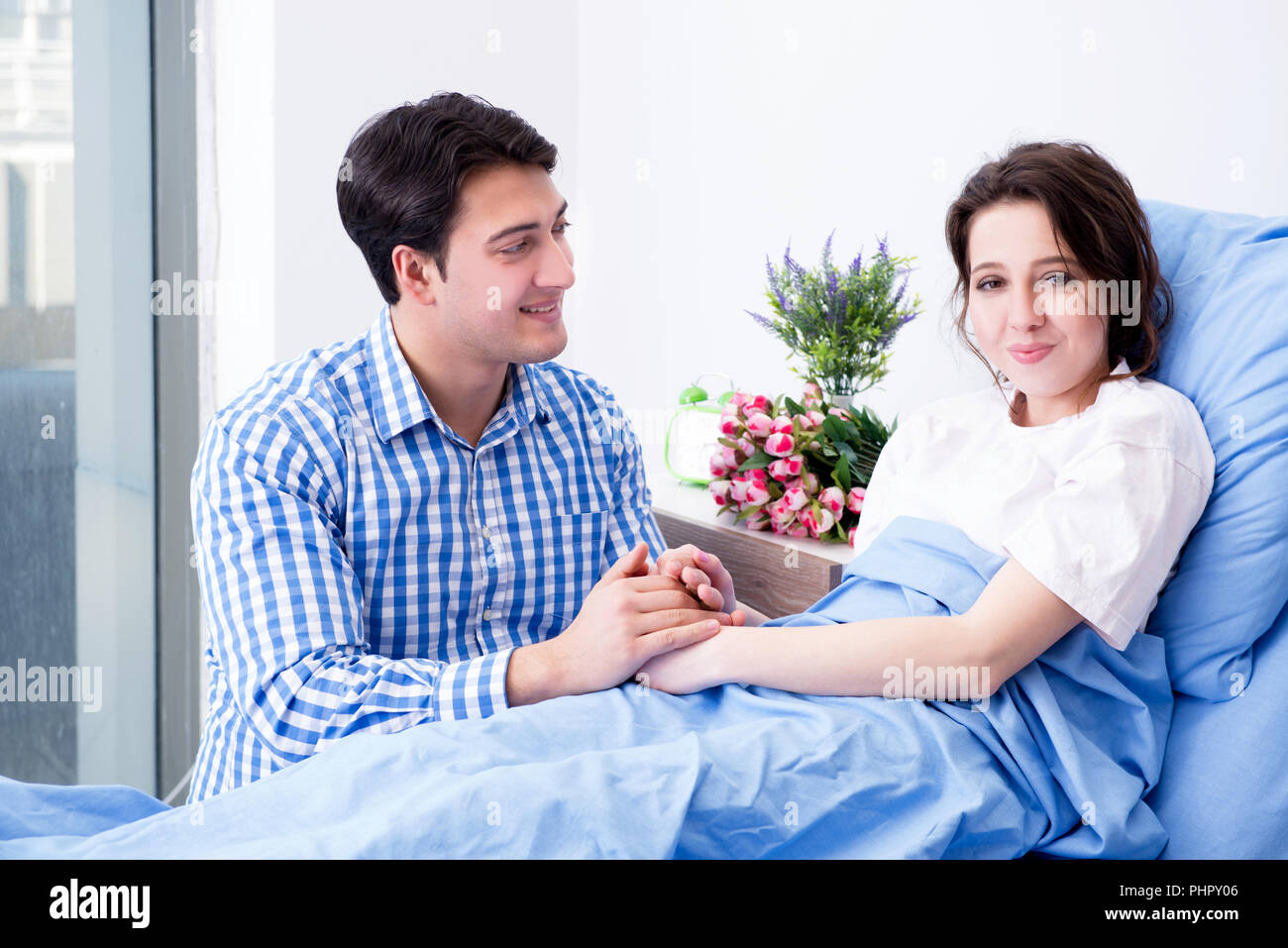 Loving husband caring sick wife hi-res stock photography and images - Alamy