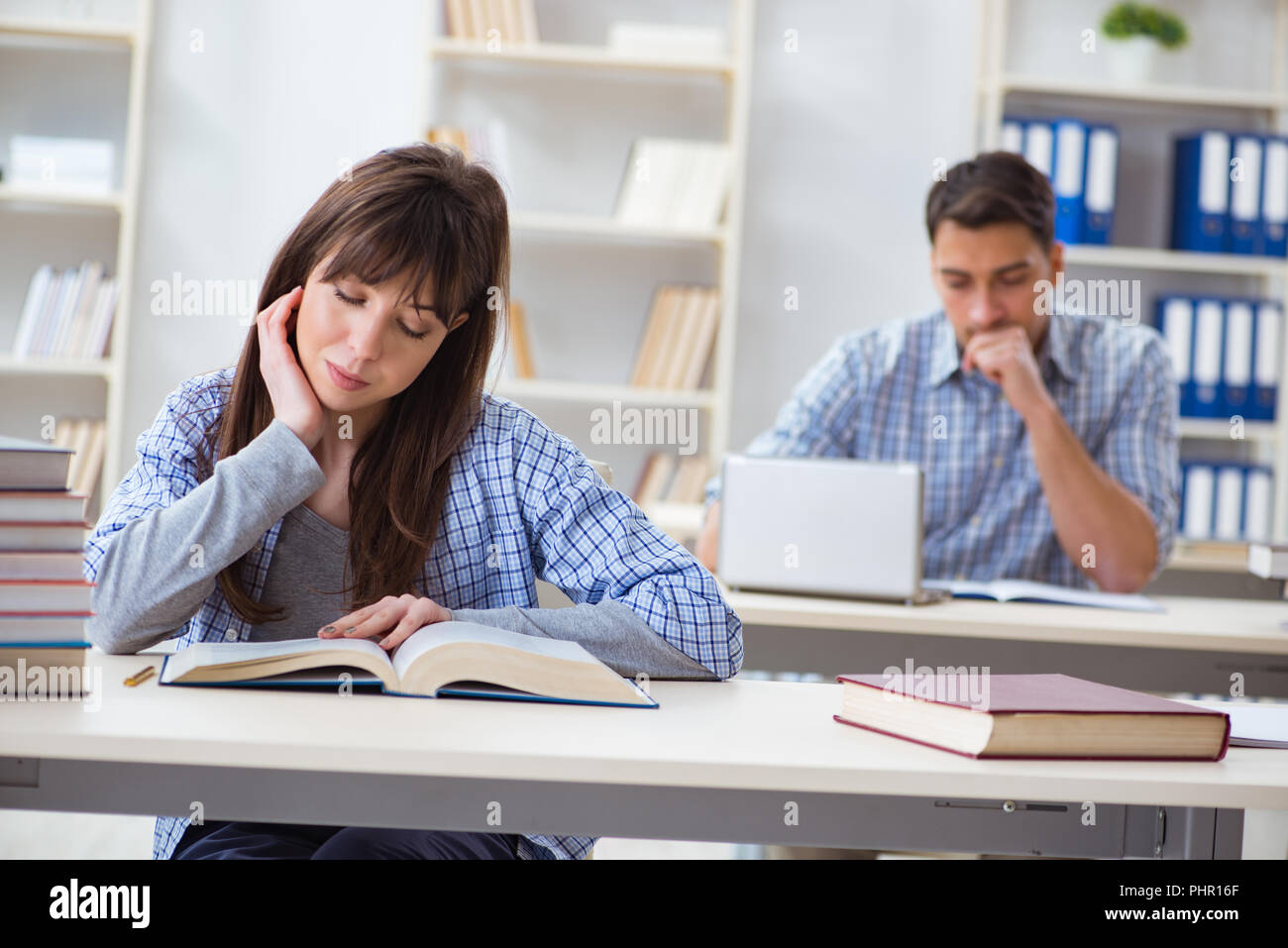 Students sitting and studying in classroom college Stock Photo - Alamy