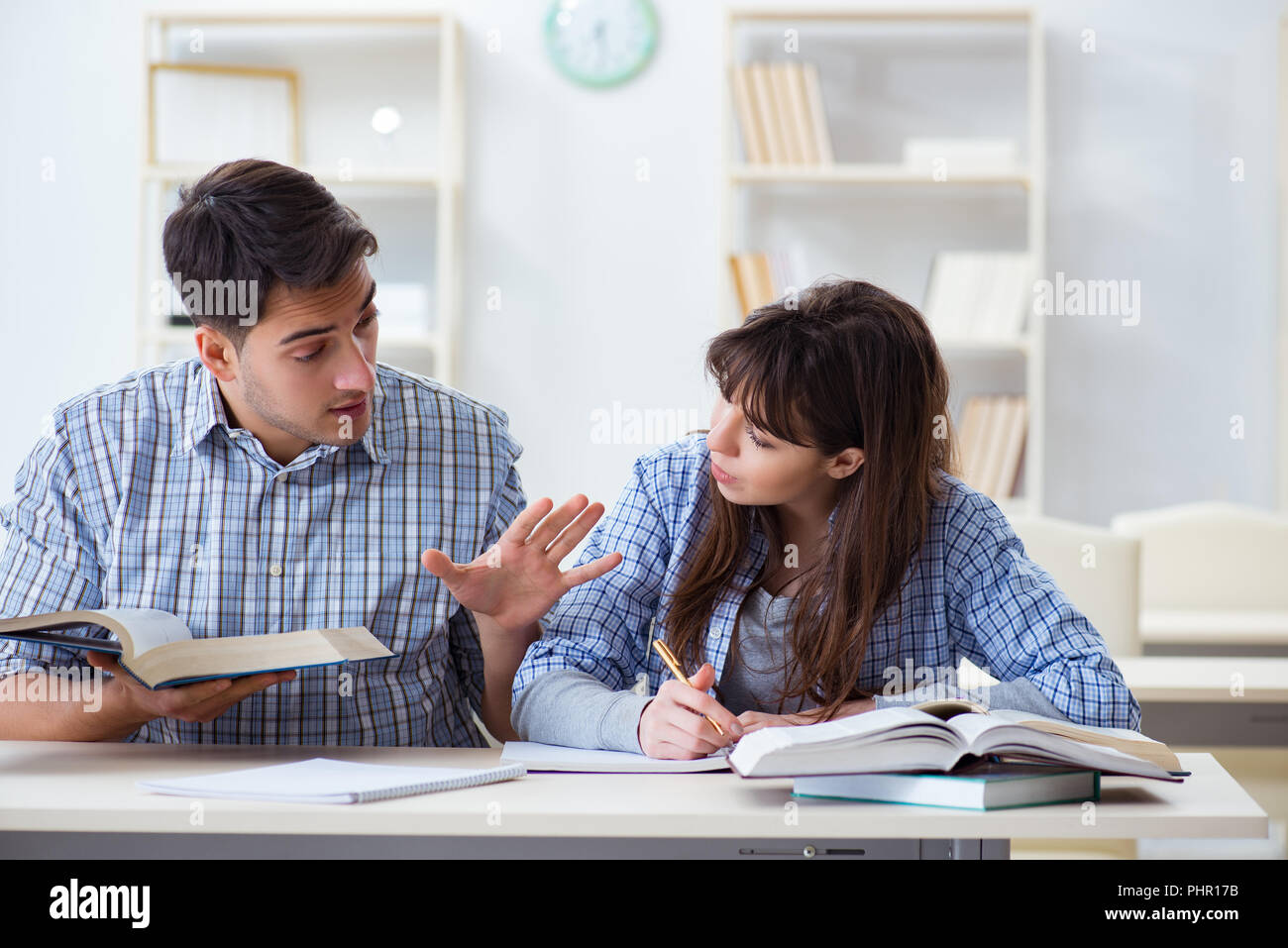 Students sitting and studying in classroom college Stock Photo - Alamy