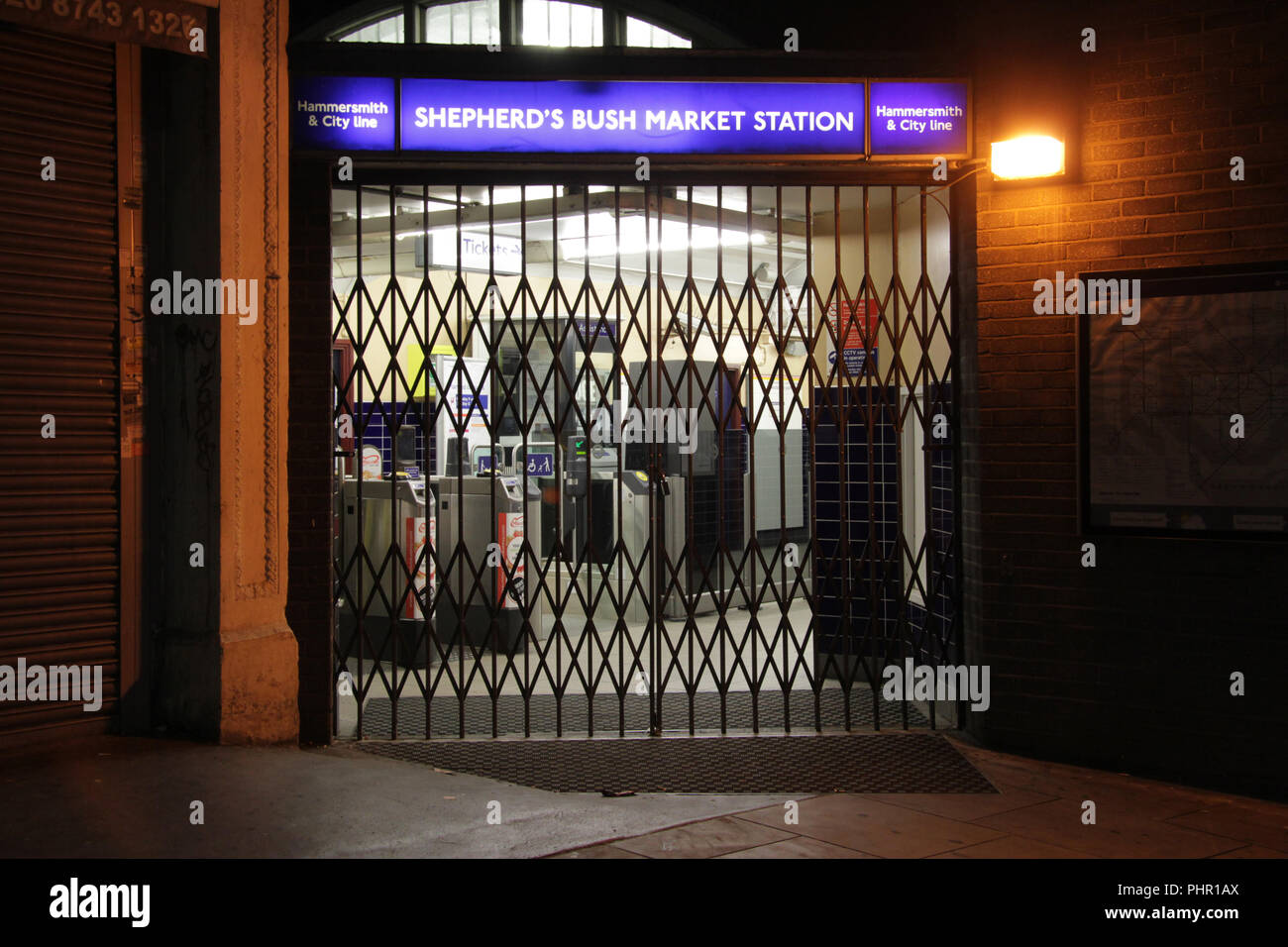 Shepherds Bush Market Tube station closed metal shutters Stock Photo ...