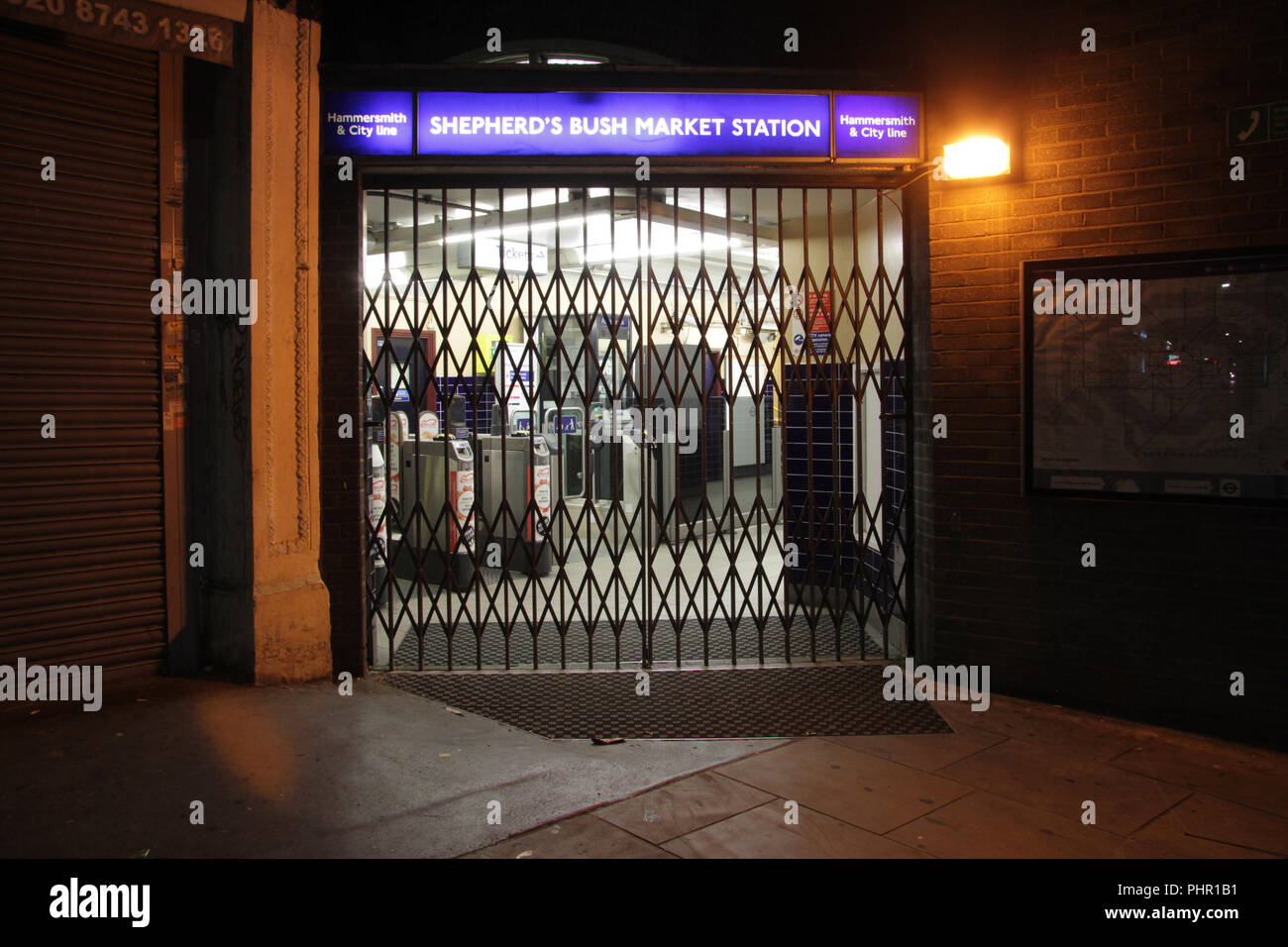 Shepherds Bush Market Tube station closed metal shutters Stock Photo ...