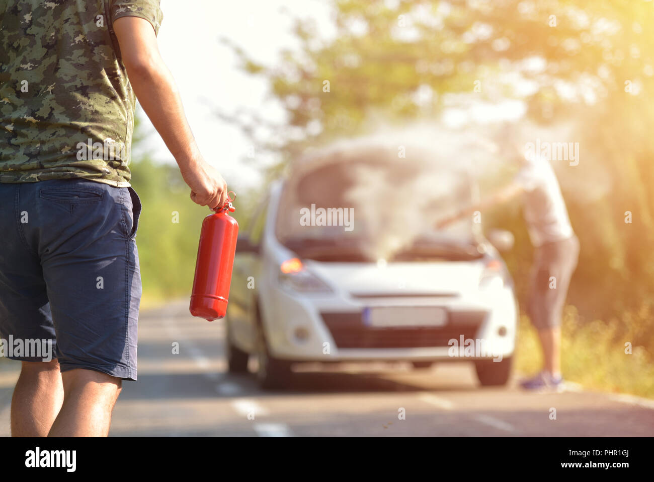 Man fire extinguisher hi-res stock photography and images - Alamy