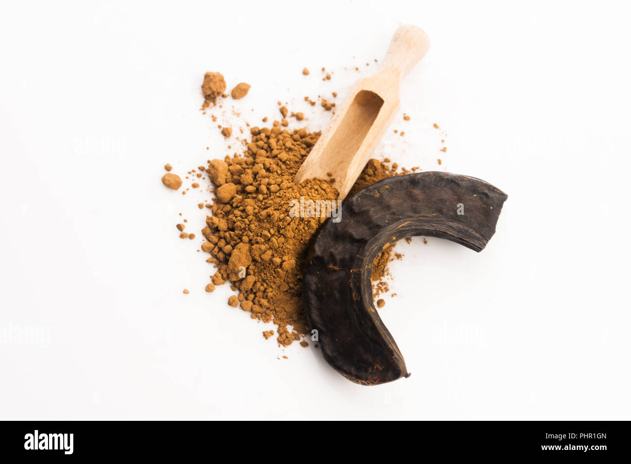 carob pods and carob powder Stock Photo - Alamy