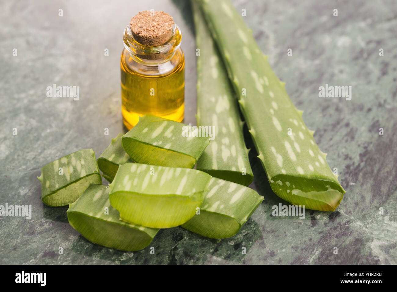 Bottle of aloe vera oil Stock Photo - Alamy
