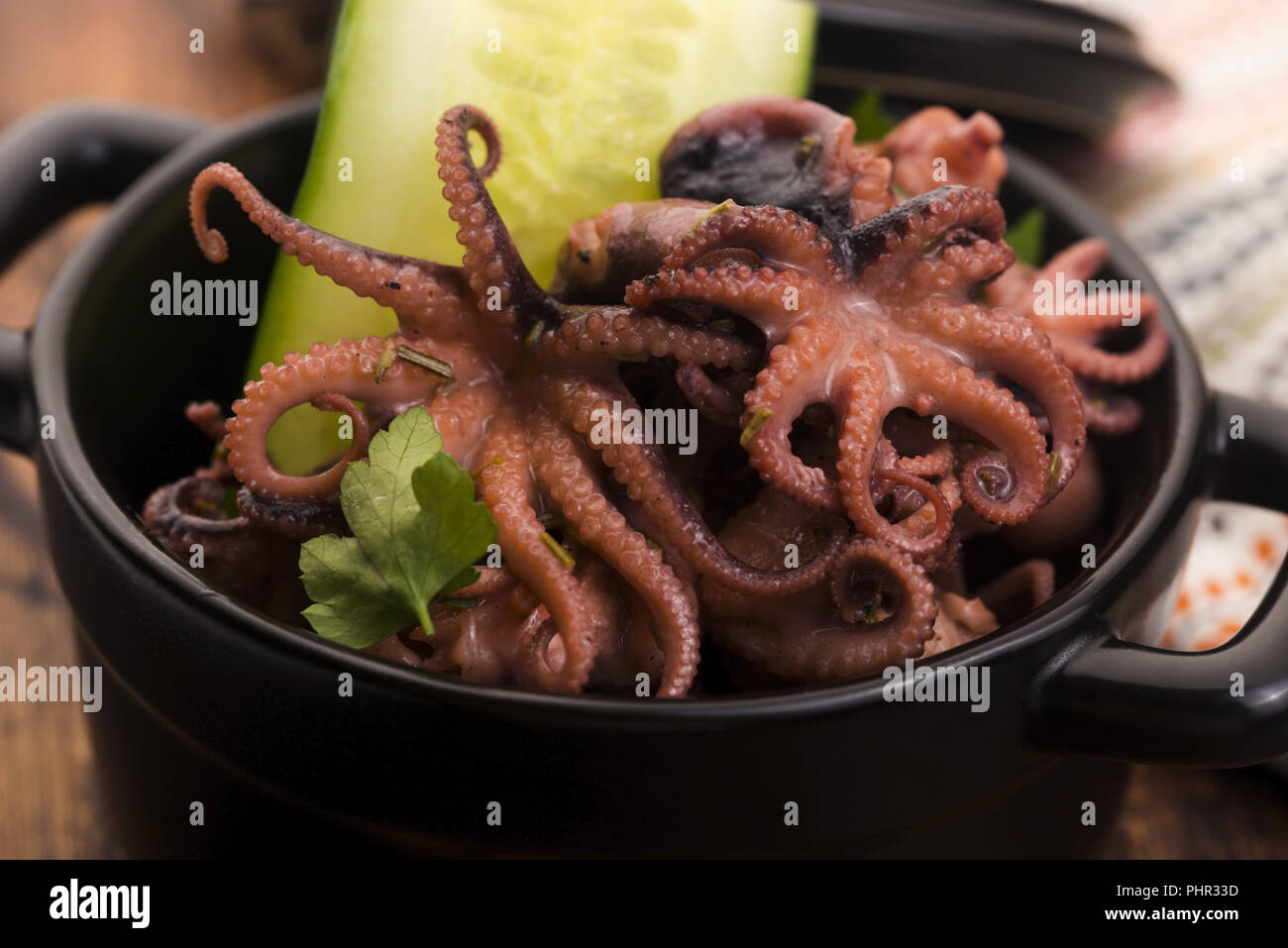 Octopus. Greek, eating Stock Photo - Alamy