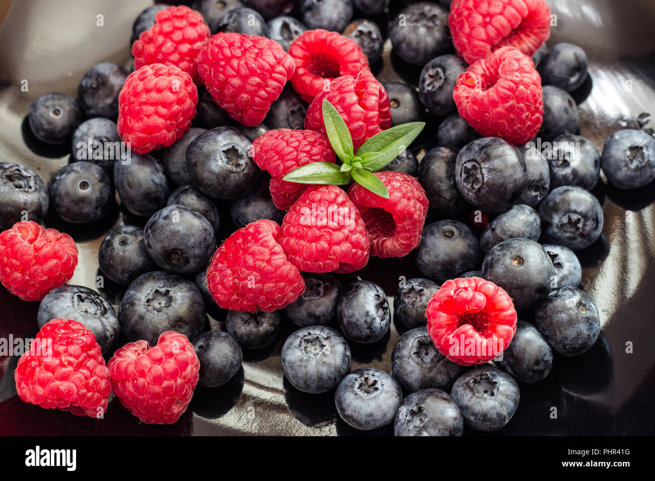 Mix of blueberries and raspberries Stock Photo - Alamy