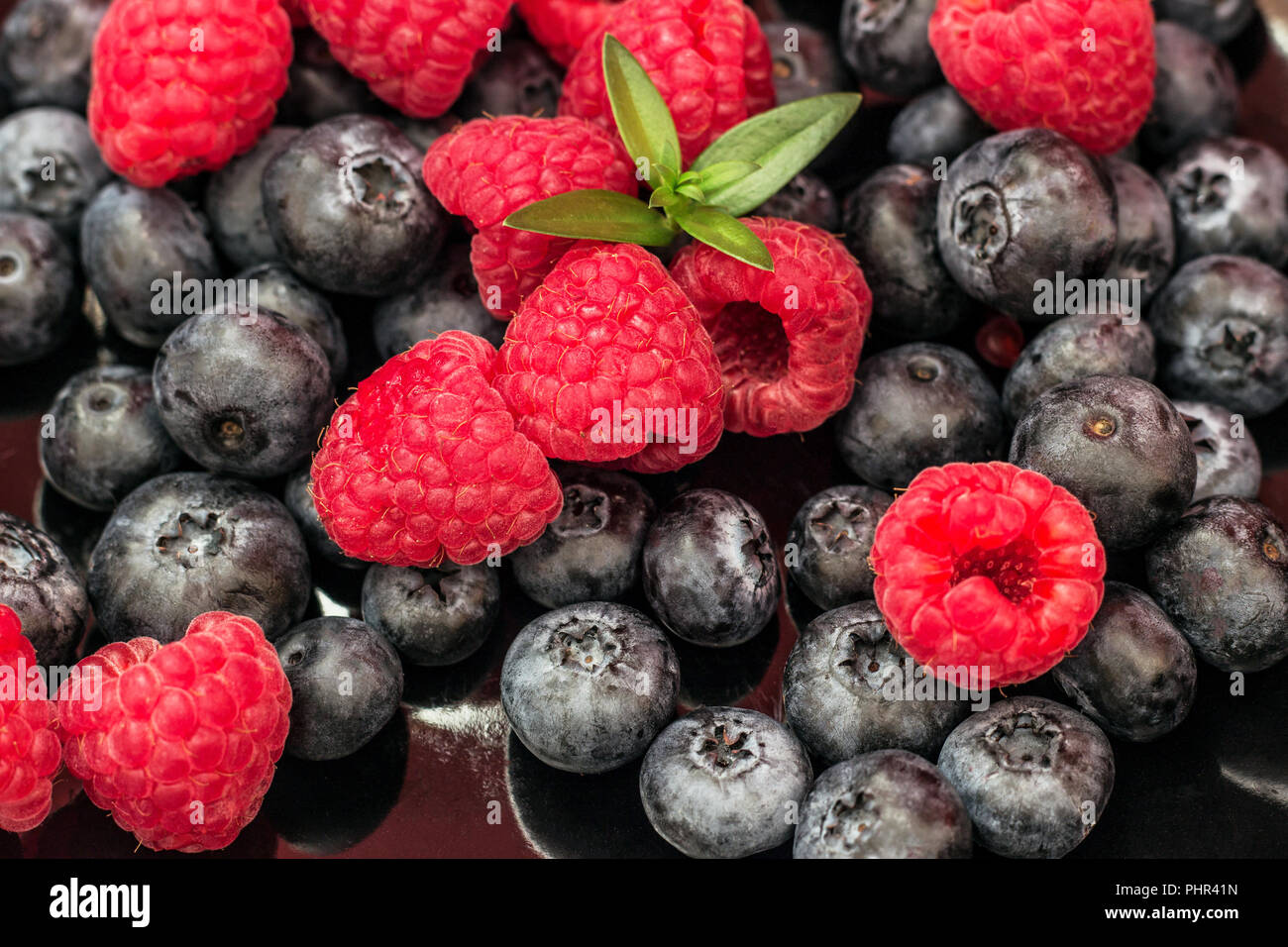 Mix of blueberries and raspberries Stock Photo - Alamy