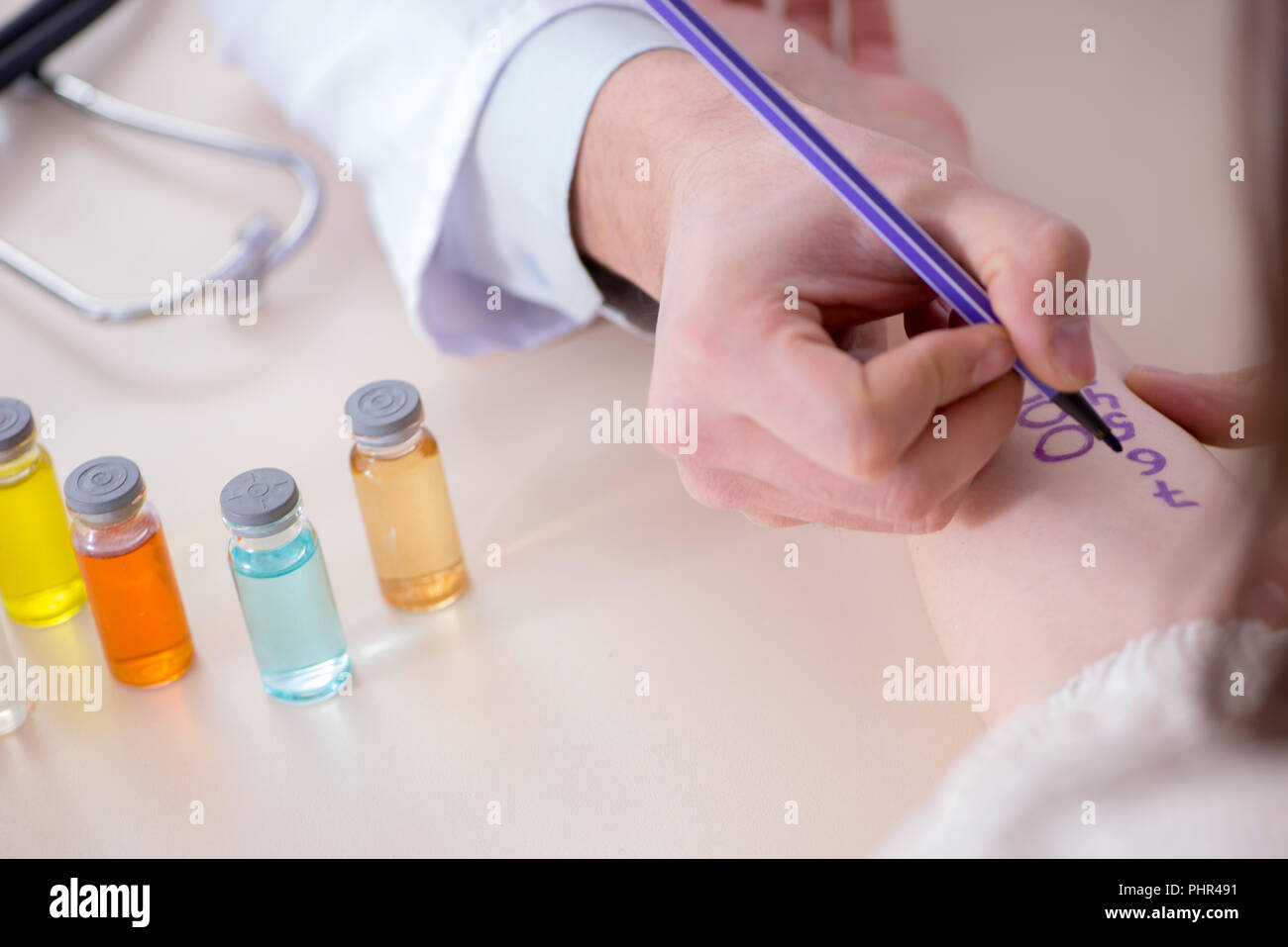 Doctor testing allergy reaction of patient in hospital Stock Photo - Alamy