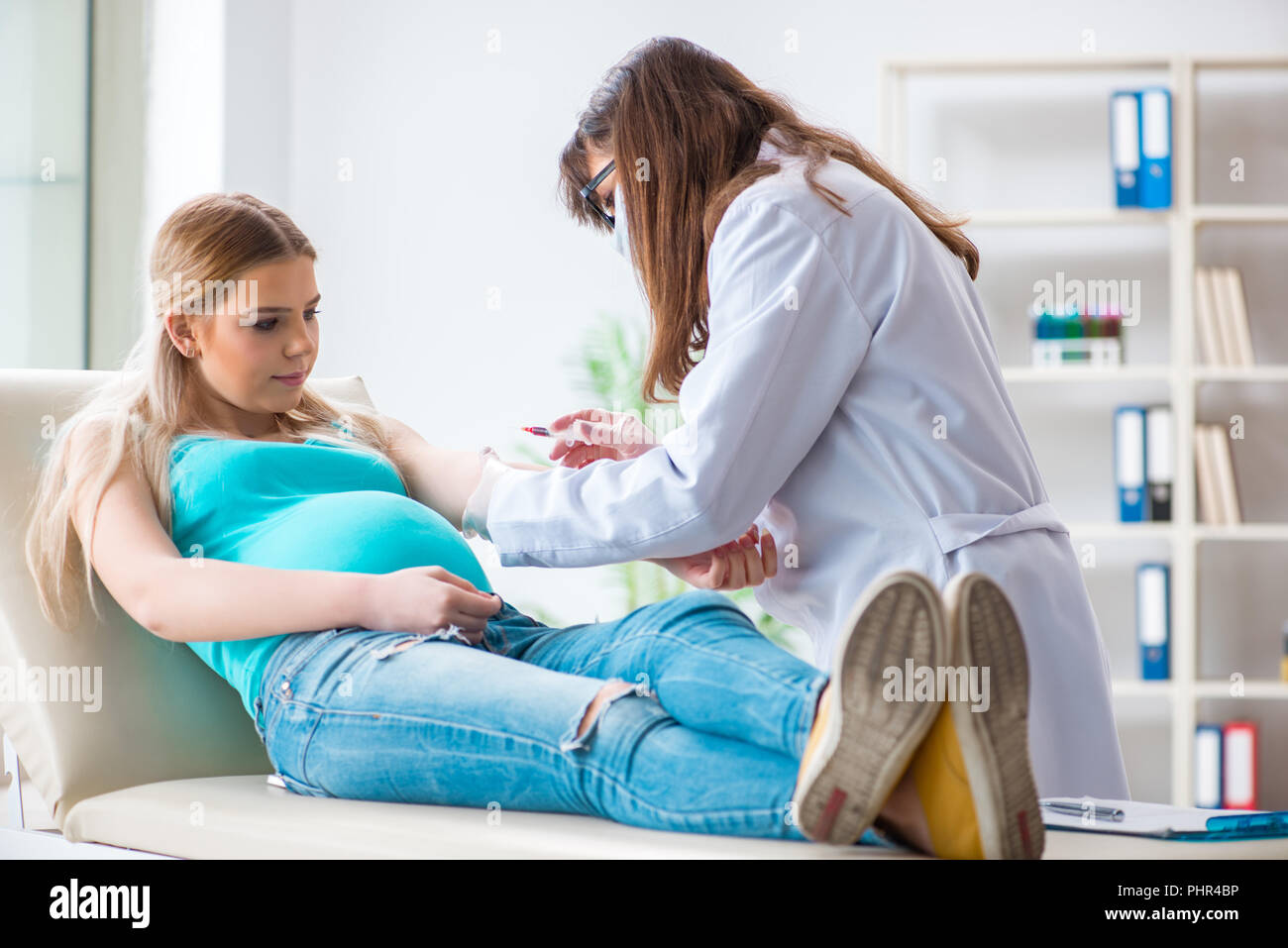 Pregnant woman at regular pregnancy check-up Stock Photo - Alamy