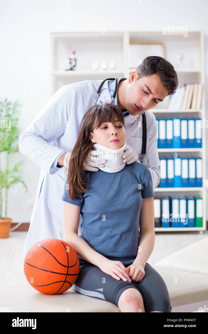 Female basketball player visiting doctor after injury Stock Photo - Alamy