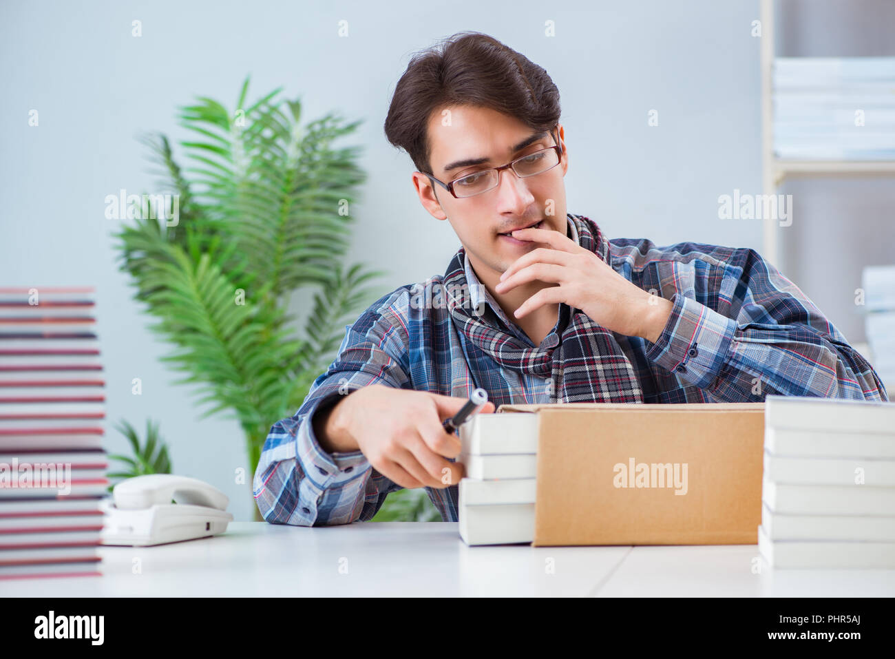 Writer presenting his books to public Stock Photo - Alamy