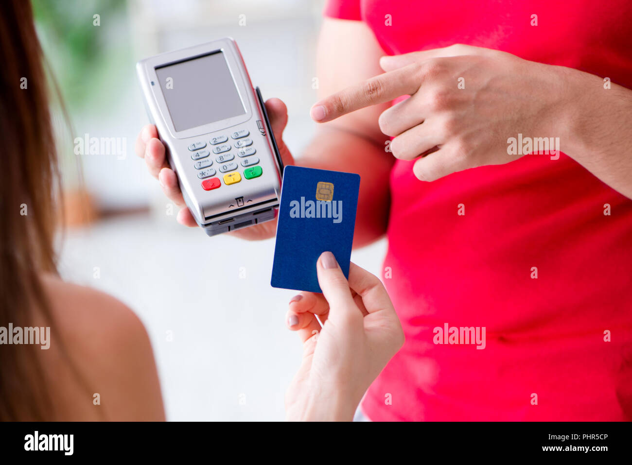 Concept of paying with POS terminal Stock Photo - Alamy