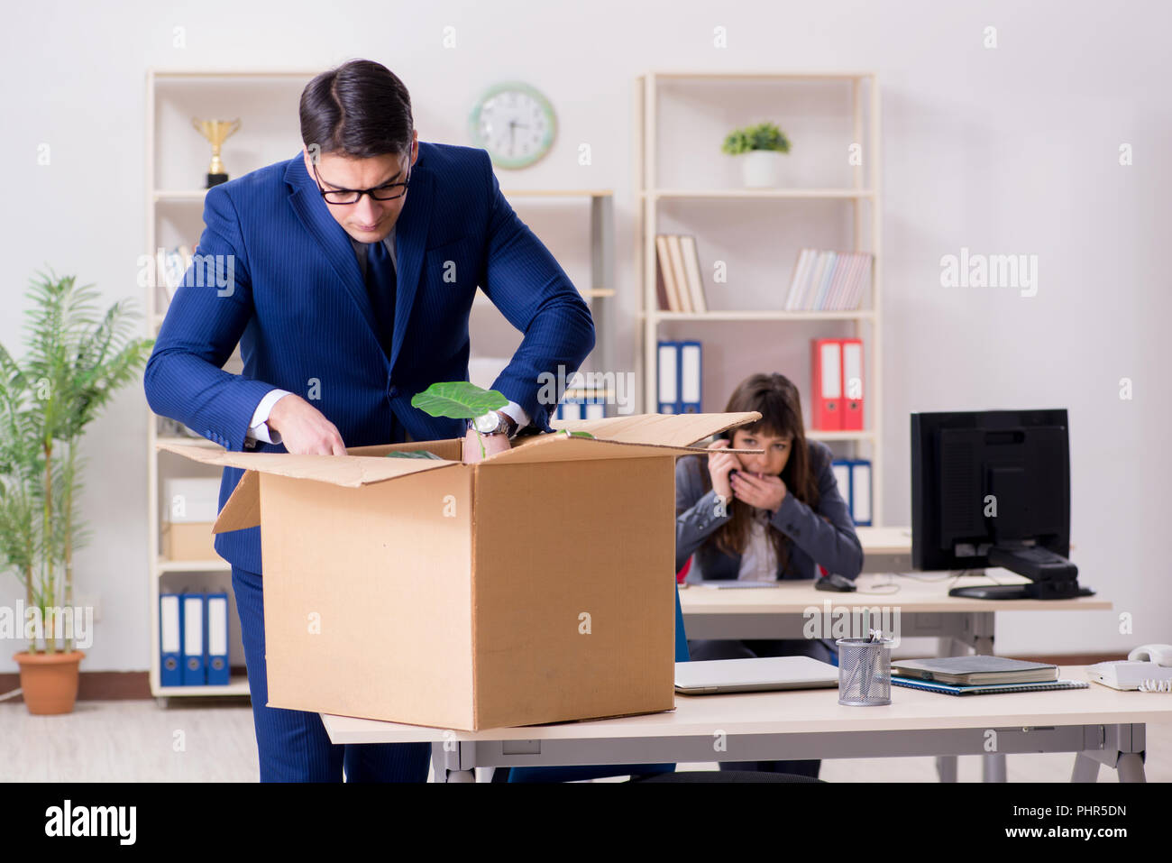 Person being fired from his work Stock Photo - Alamy