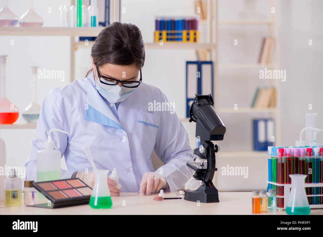 Lab chemist checking beauty and make-up products Stock Photo - Alamy