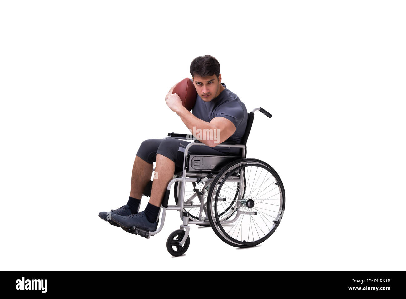 Football player recovering from injury on wheelchair Stock Photo - Alamy