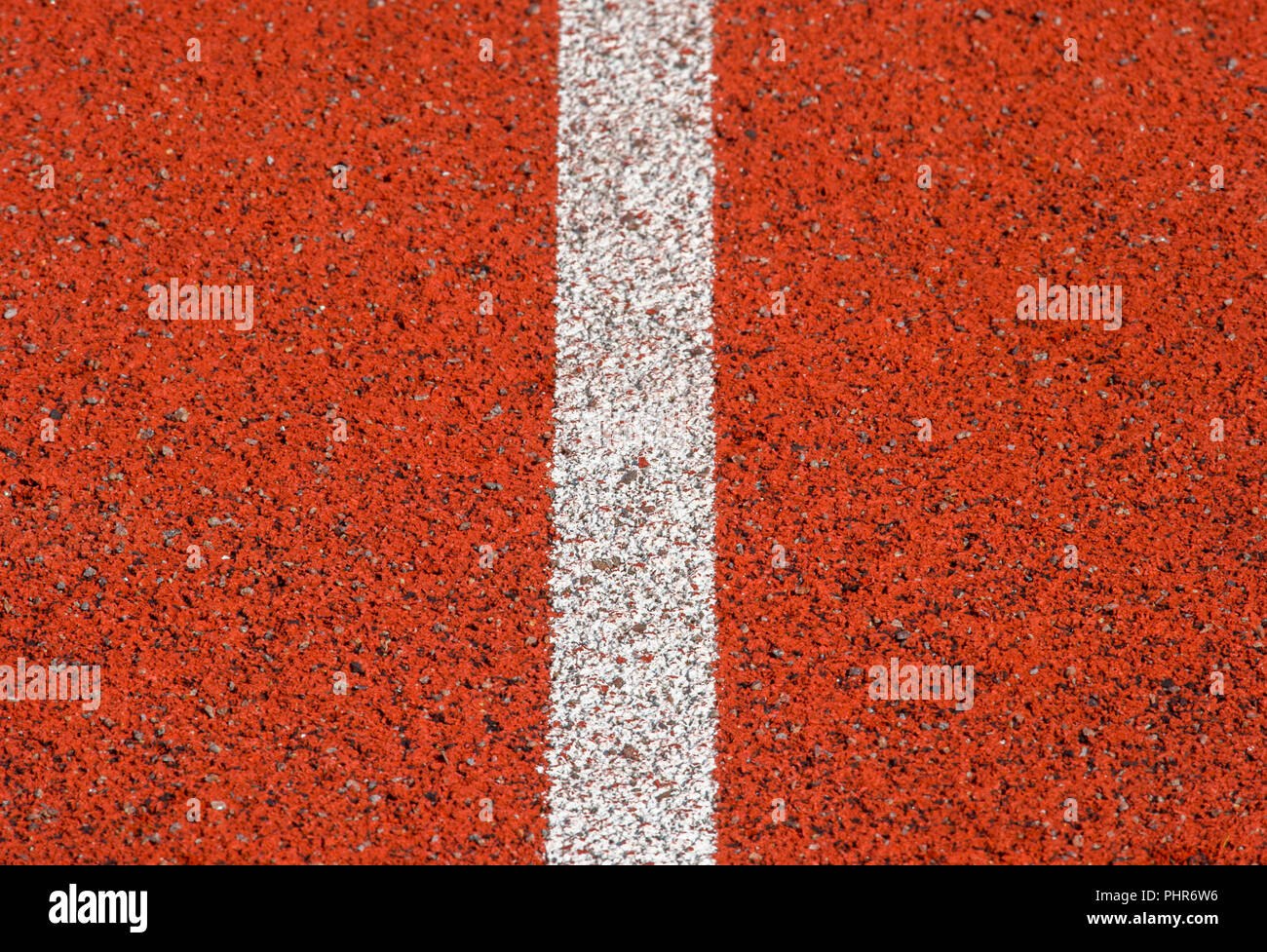 running track rubber standard red color and white line Stock Photo - Alamy