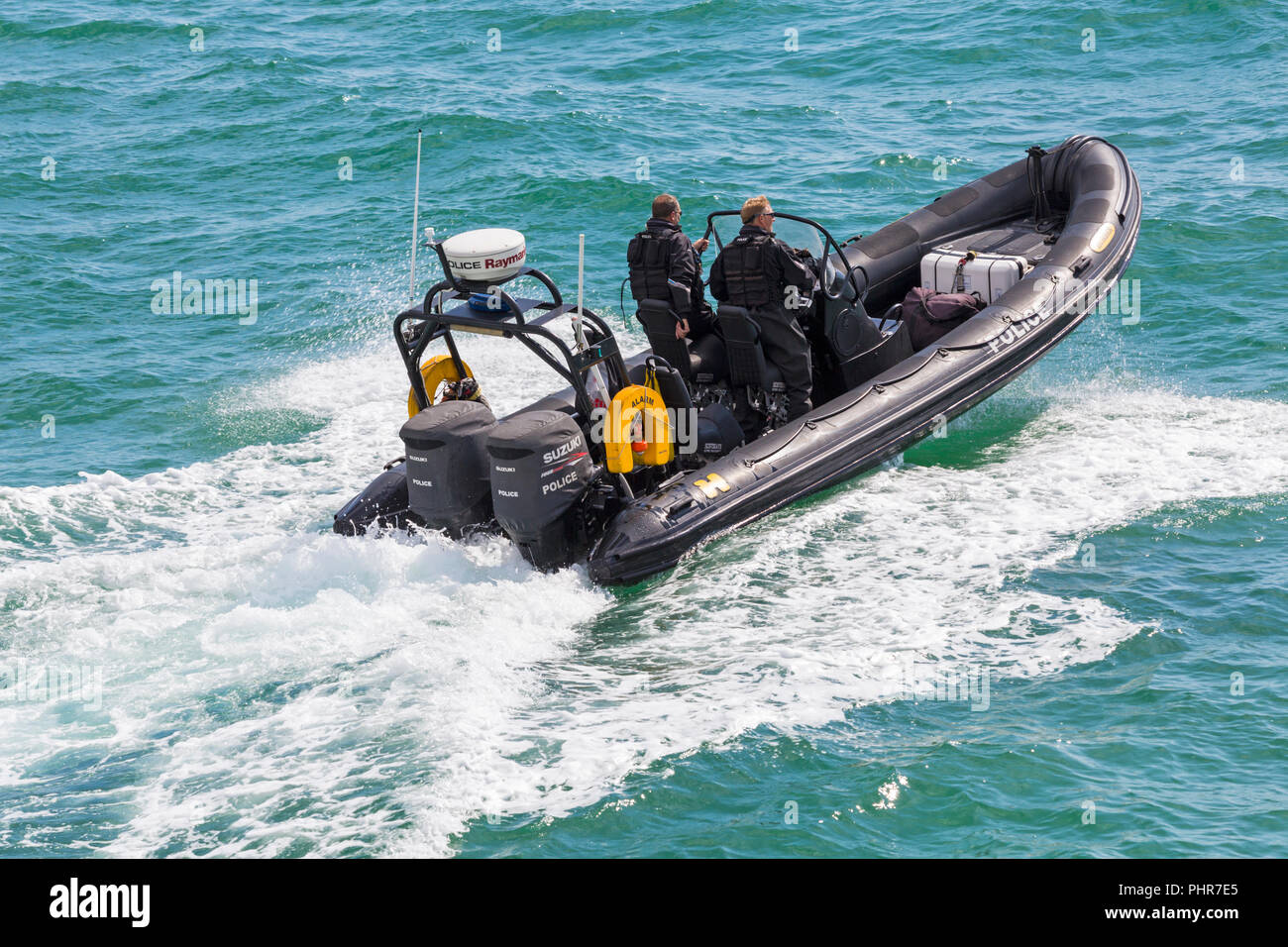 police on patrol on the sea at Bournemouth, Dorset UK in September ...