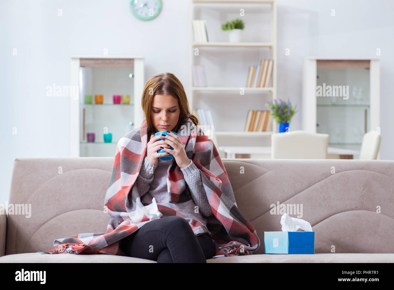 Sick woman suffering from flu at home Stock Photo - Alamy