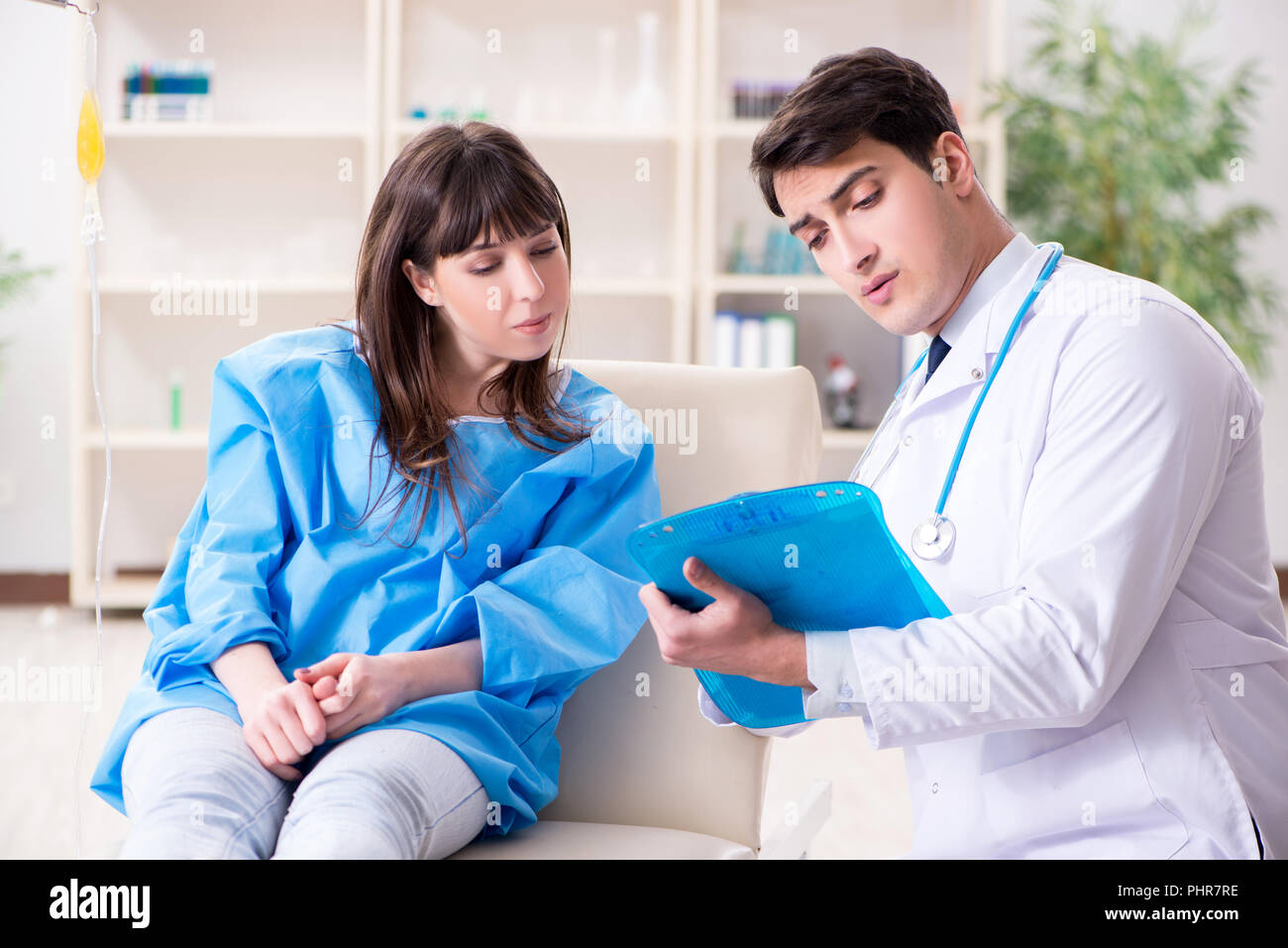 Doctor discussing blood transfusion with patient Stock Photo - Alamy