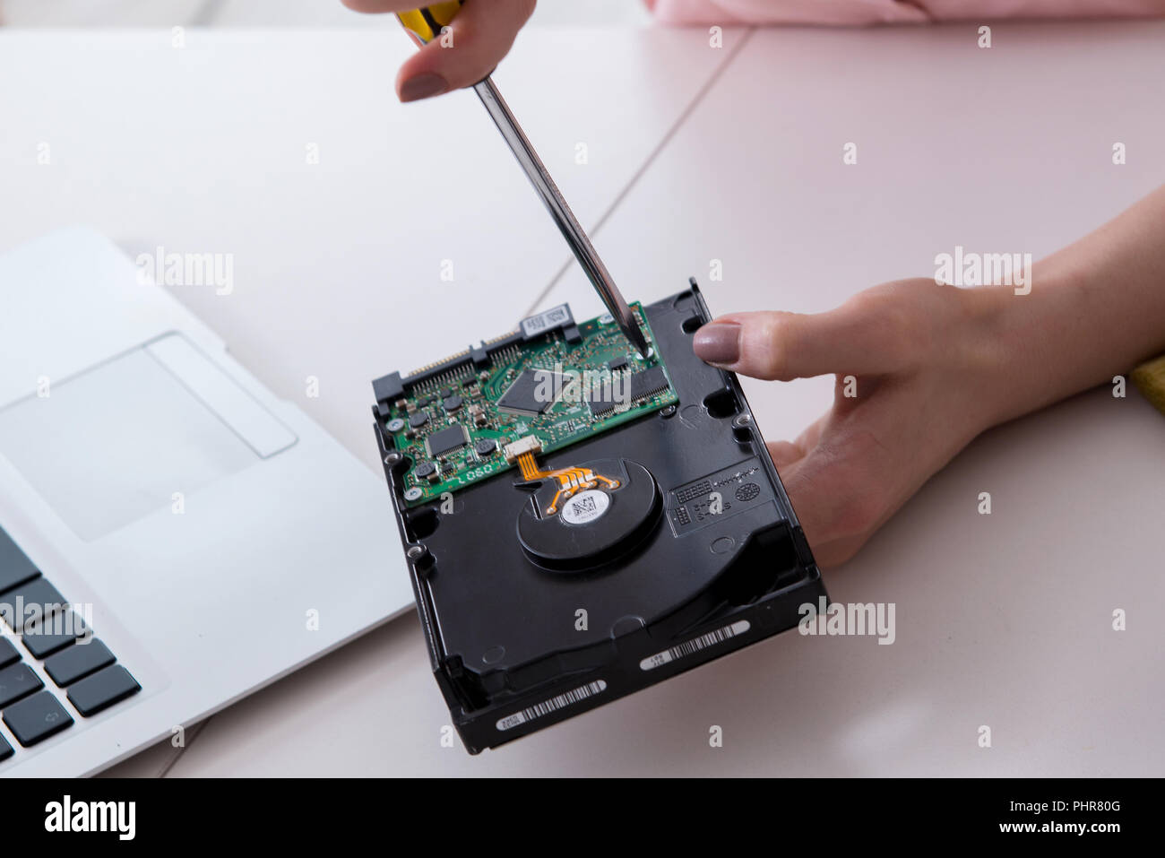 Hard drive repair and data recovery with restoration Stock Photo - Alamy
