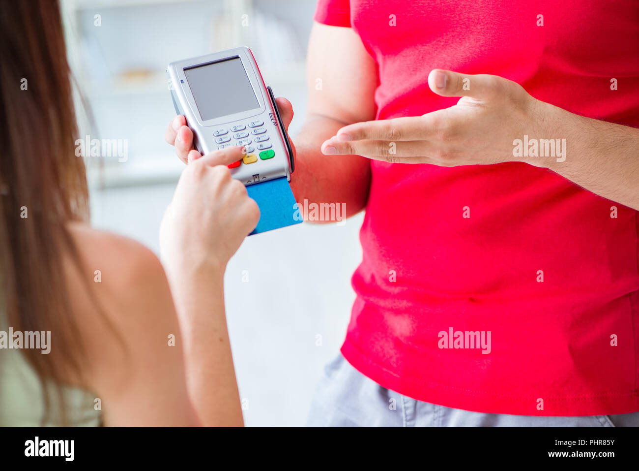 Concept of paying with POS terminal Stock Photo - Alamy