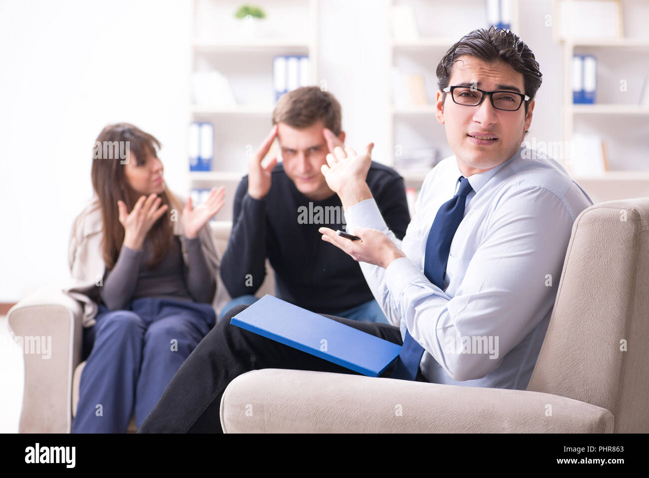 Family visiting psychologist for family problem Stock Photo - Alamy
