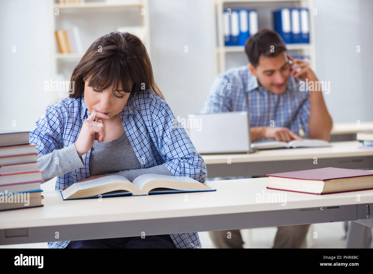 Students sitting and studying in classroom college Stock Photo - Alamy