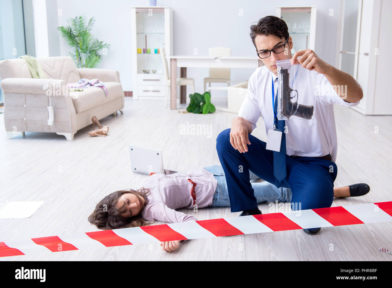 Forensic Investigator At The Crime Scene Investigating Woman Mur Stock