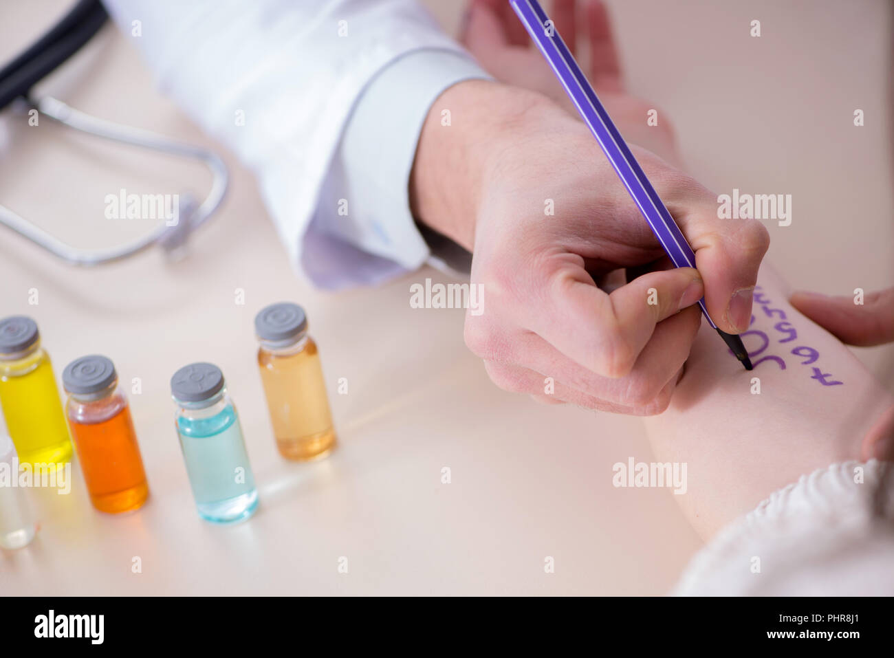 Doctor testing allergy reaction of patient in hospital Stock Photo - Alamy