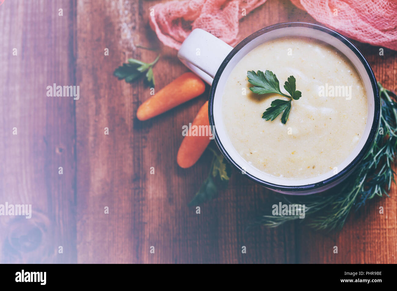 Vegetable soup puree in a mug Stock Photo - Alamy