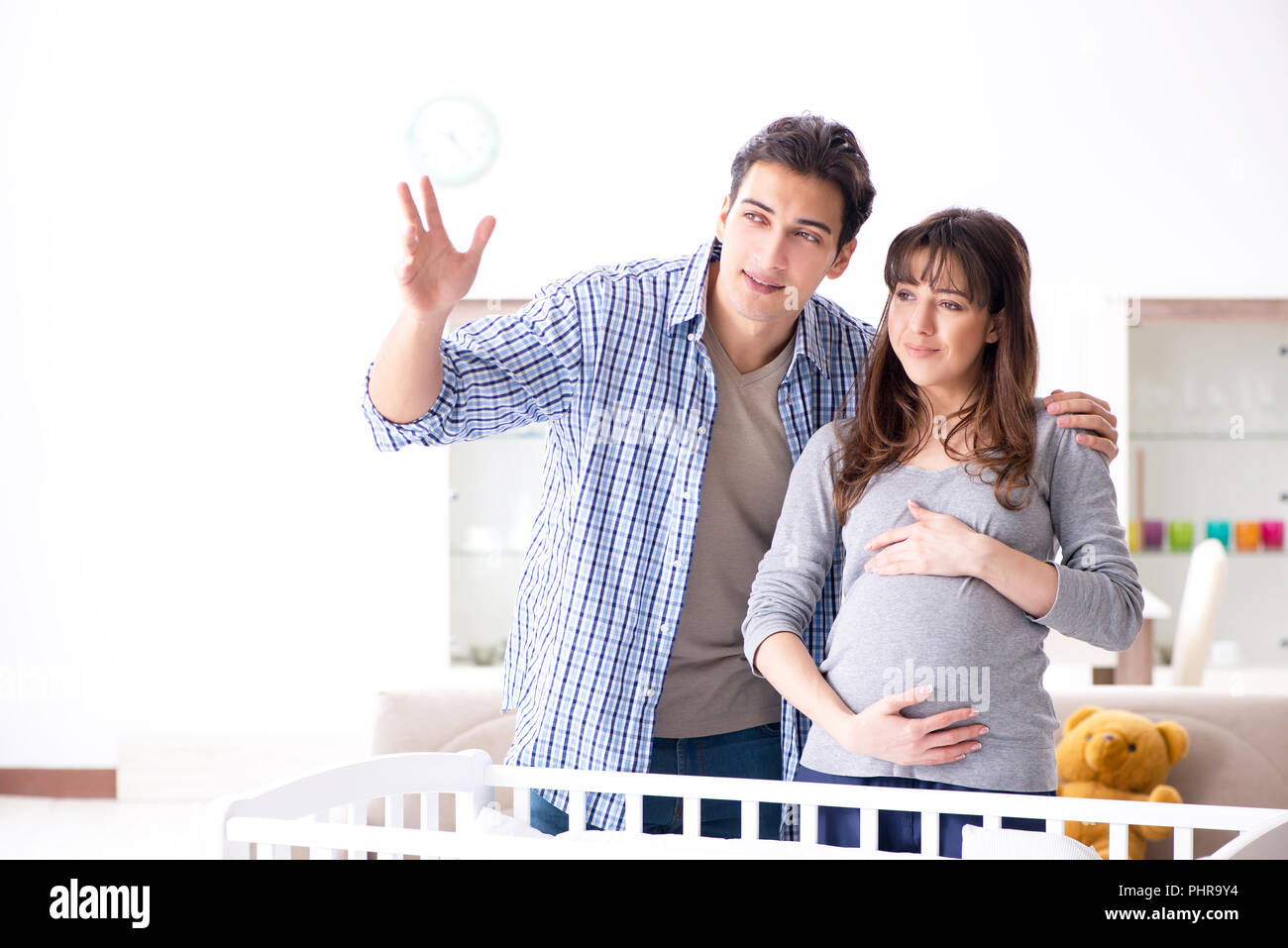 Young parents expecting their first baby Stock Photo - Alamy