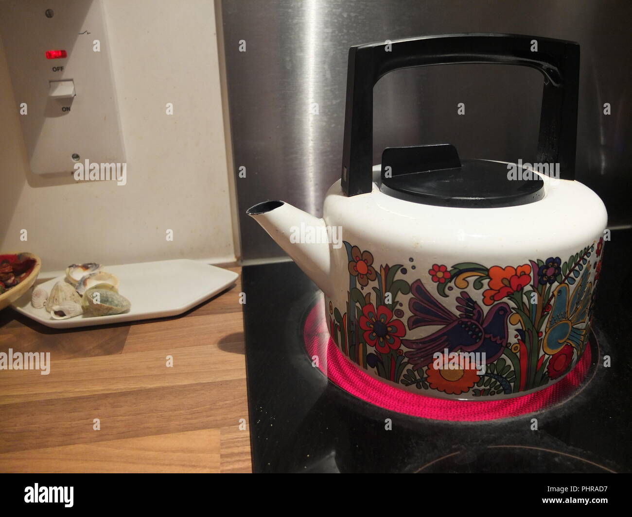 Enamel kettle with colourful psychedelic 1960s pattern design with ...