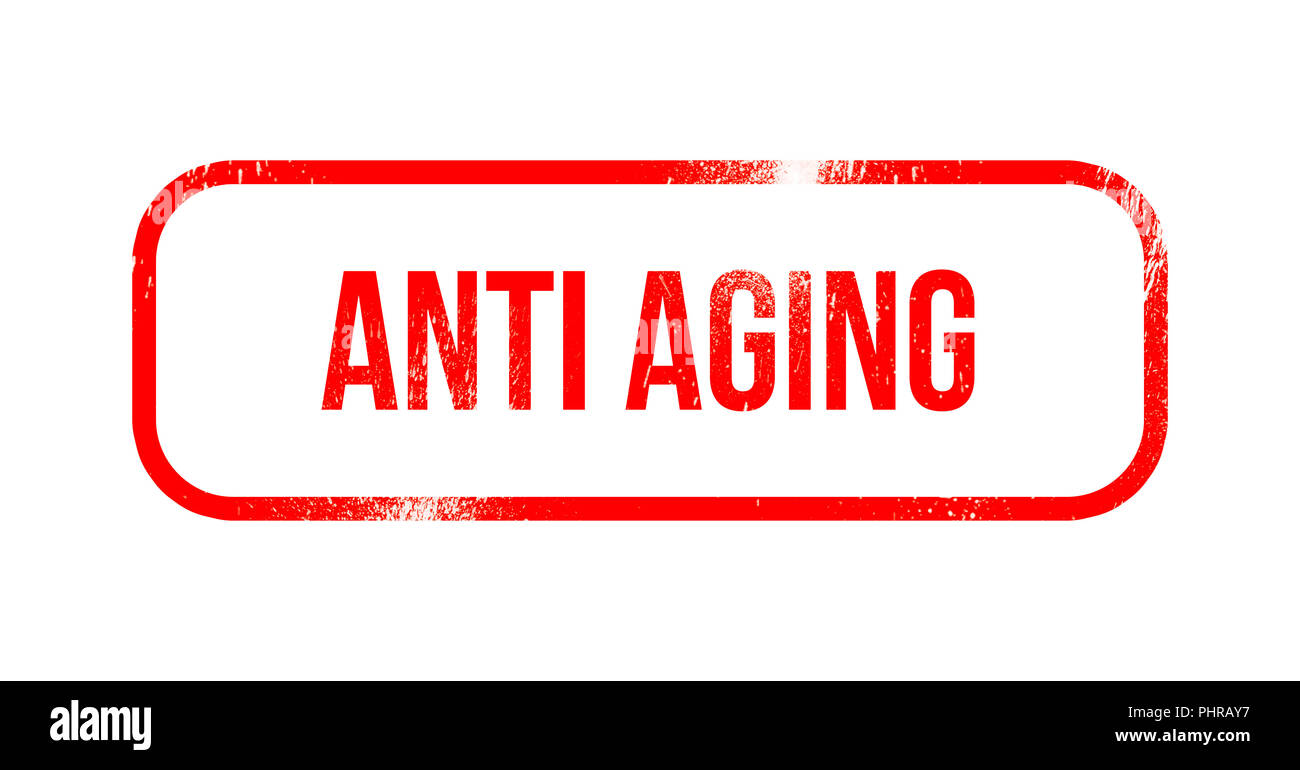 anti aging - red grunge rubber, stamp Stock Photo - Alamy