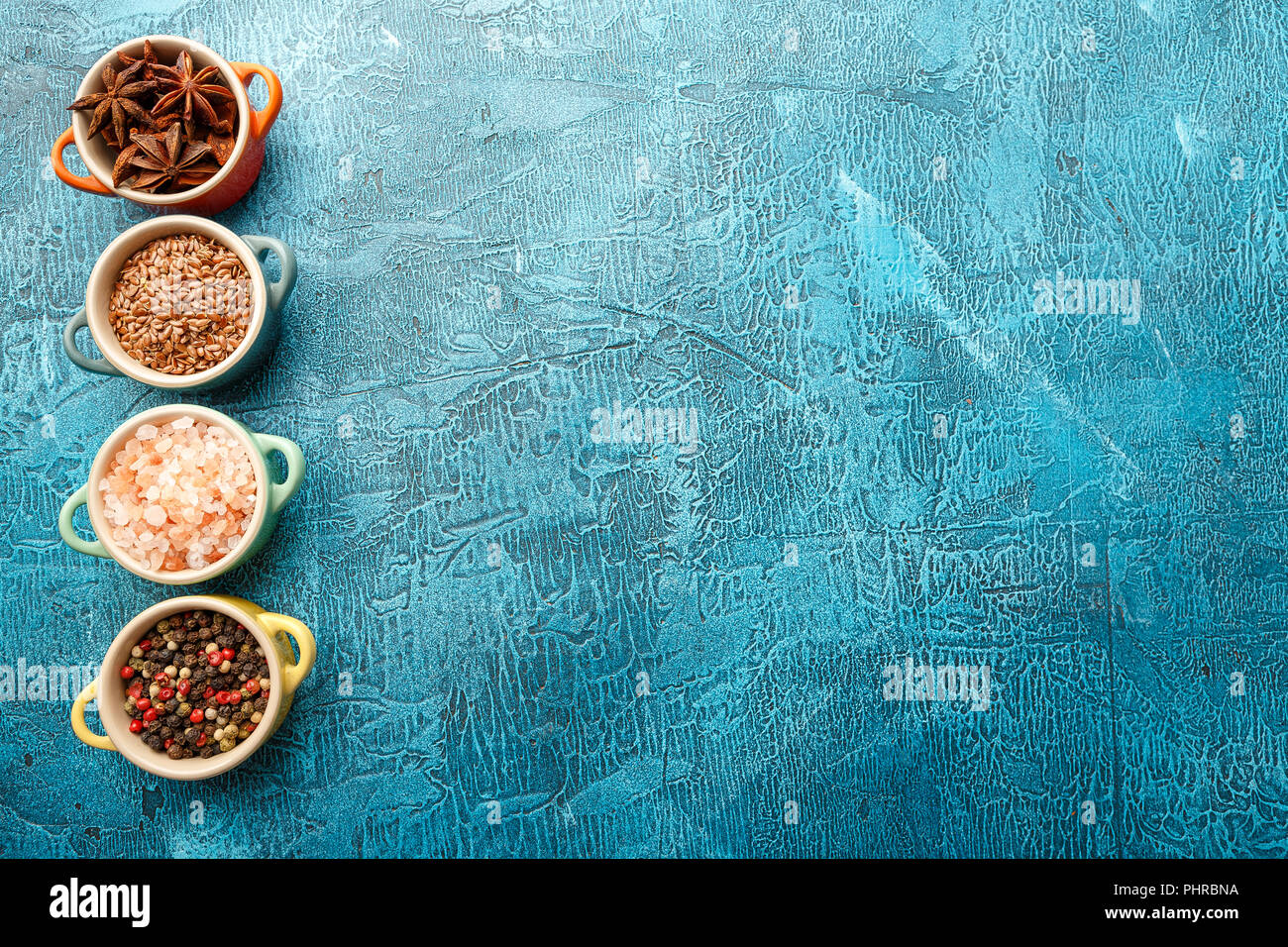 Spices and condiments in small bowls Stock Photo - Alamy