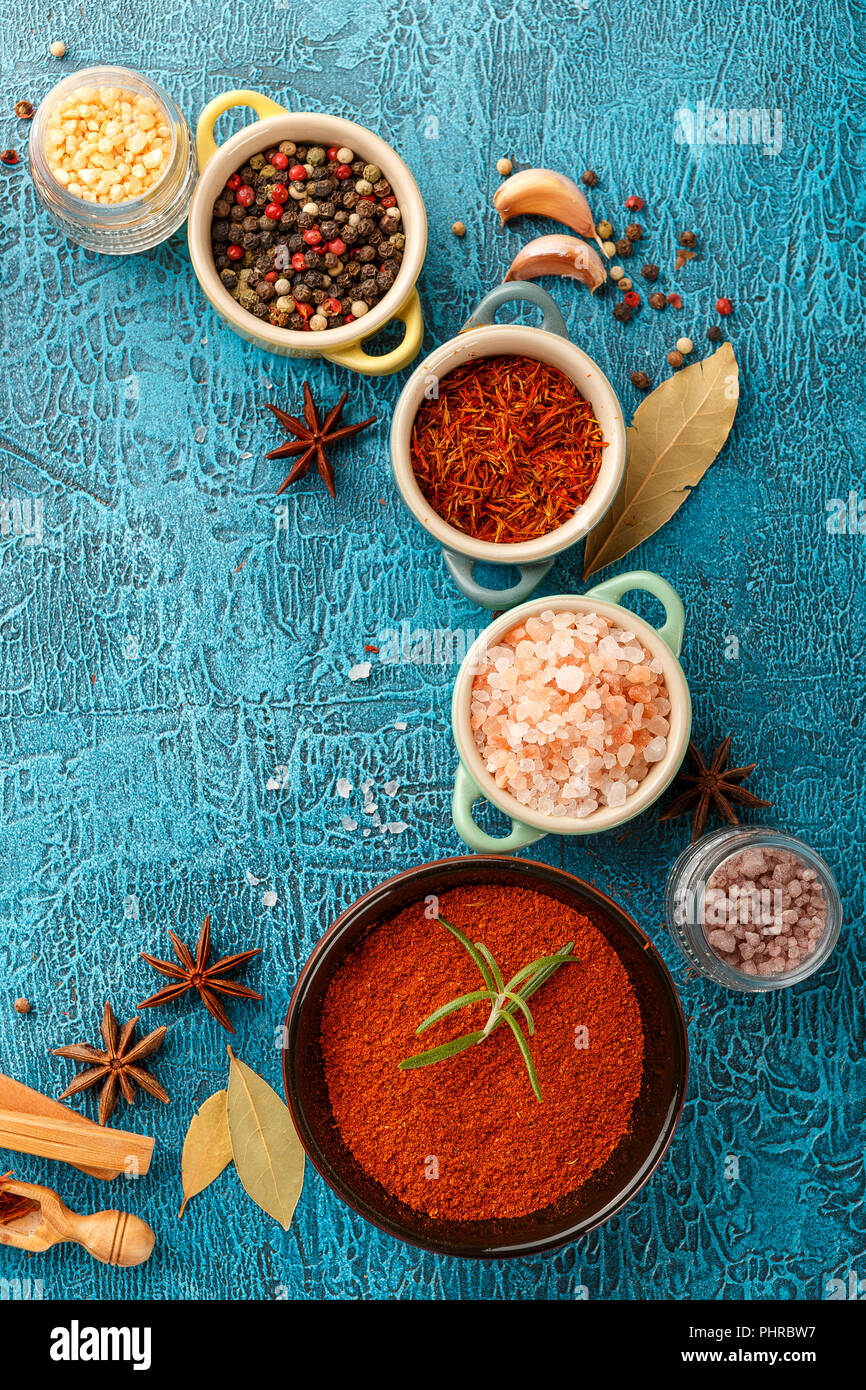 Spices and condiments in small bowls Stock Photo - Alamy