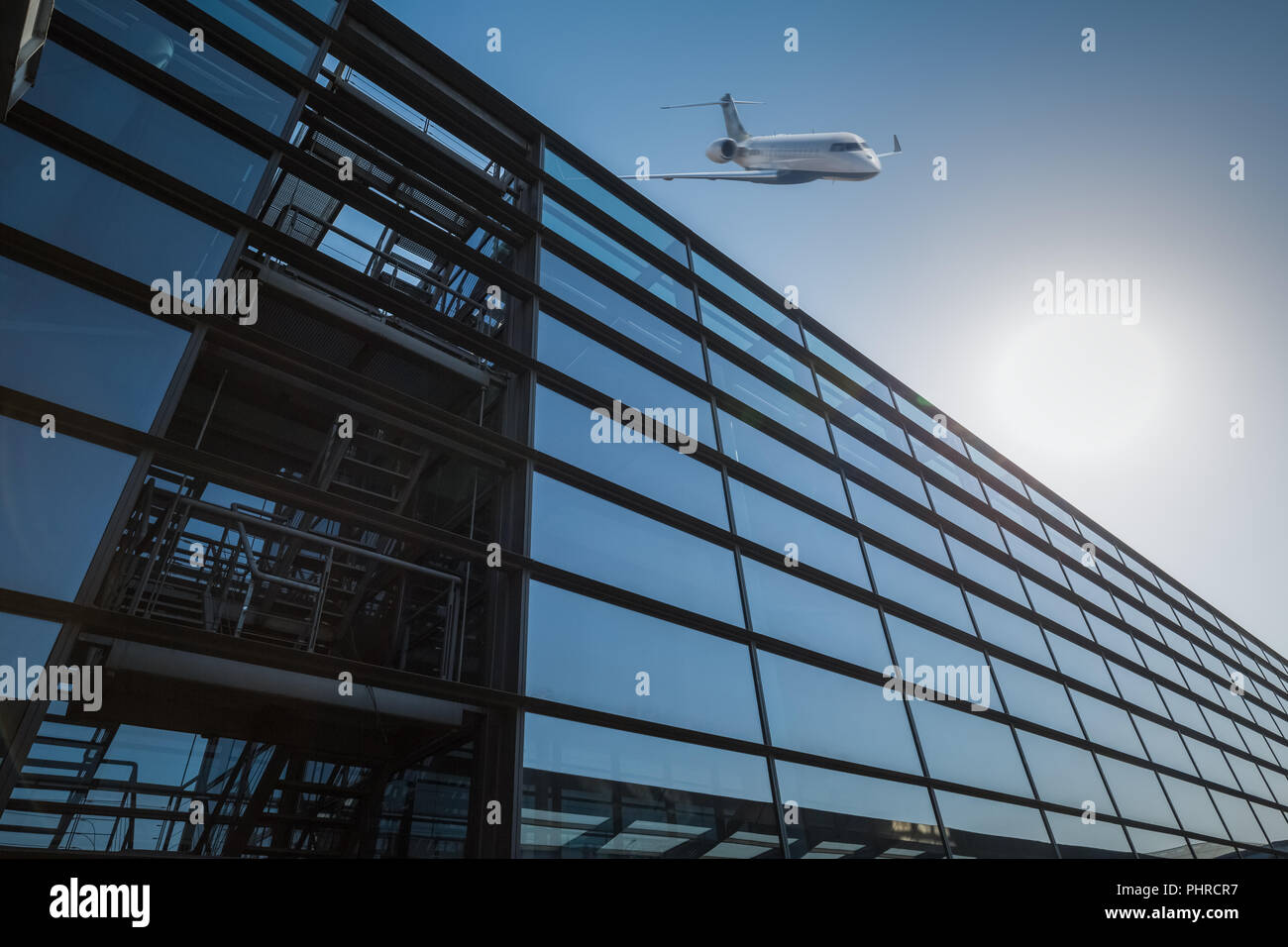 airplane on airport terminal Stock Photo - Alamy