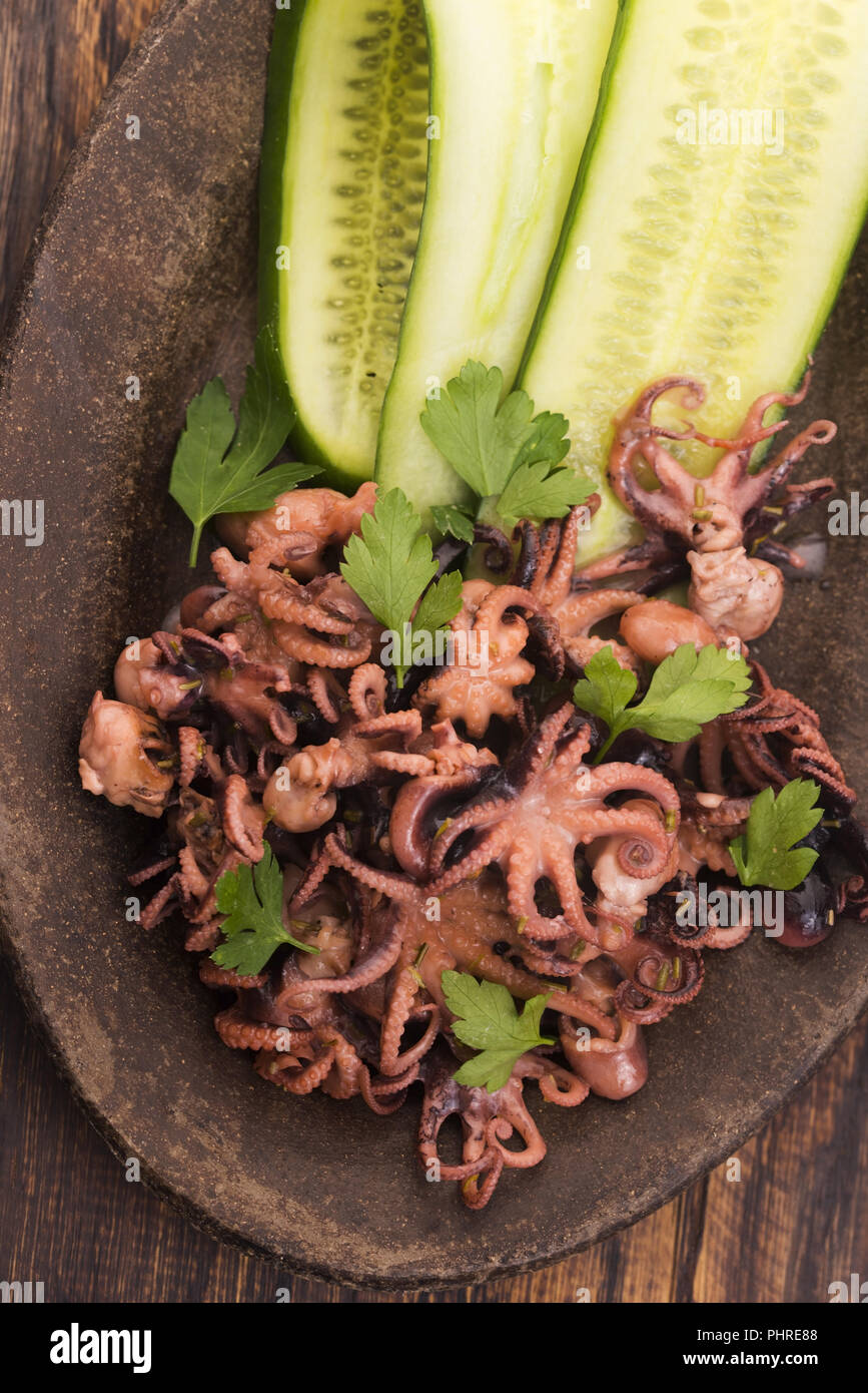 Octopus. Greek, eating Stock Photo - Alamy