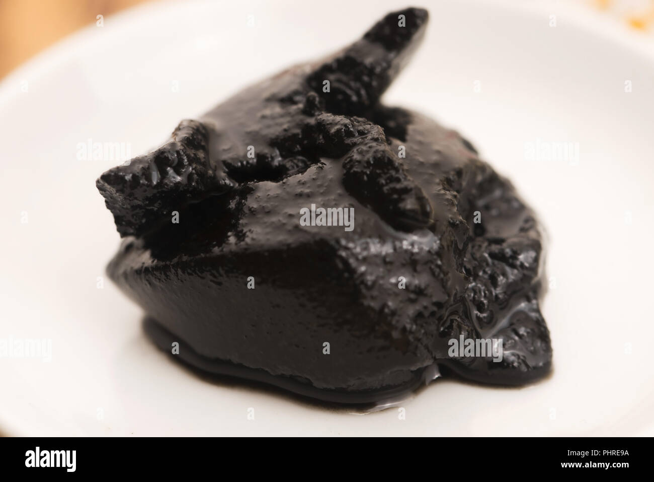 Black sesame paste Stock Photo - Alamy