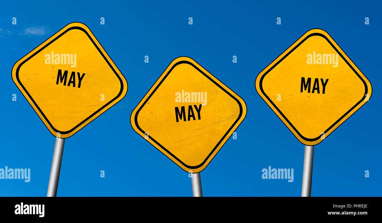 May - yellow signs with blue sky Stock Photo - Alamy