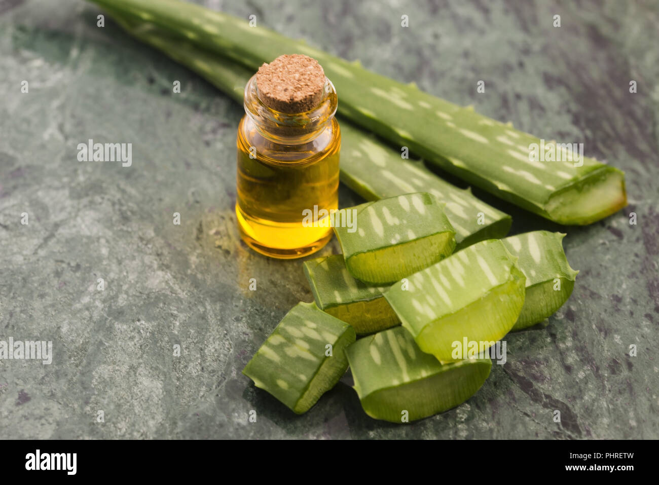 Bottle of aloe vera oil Stock Photo - Alamy