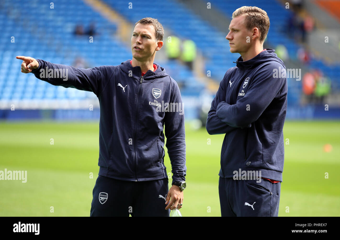 Arsenal's Stephan Lichtsteiner (left) and Arsenal goalkeeper Bernd Leno ...