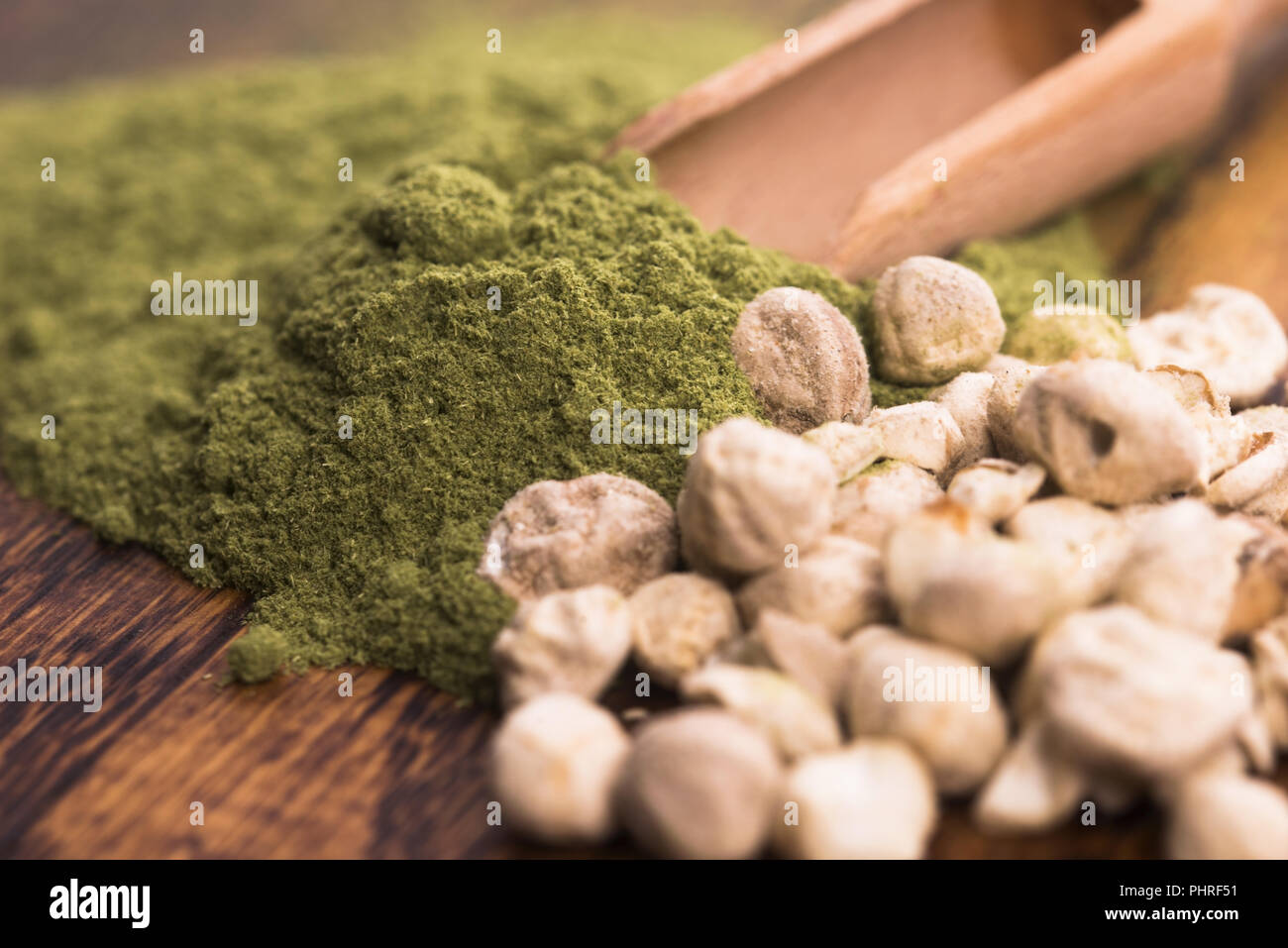 Moringa leaf powder and seeds Stock Photo - Alamy