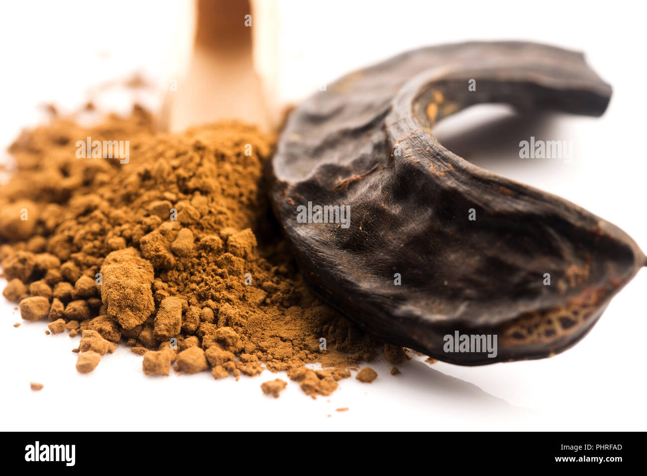 carob pods and carob powder Stock Photo - Alamy